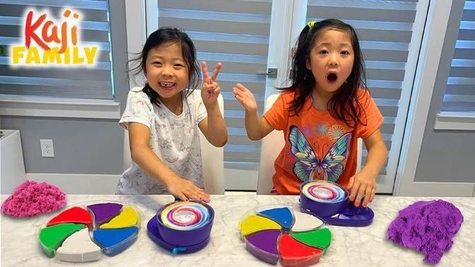 Emma and Kate Play in Kinetic Sand Spin Art! | Videos | Learning For ...